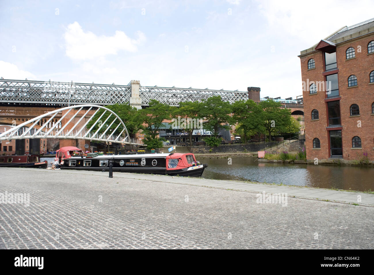 Restored warehouse, canal and railway bridge in Castlefield,Manchester ...