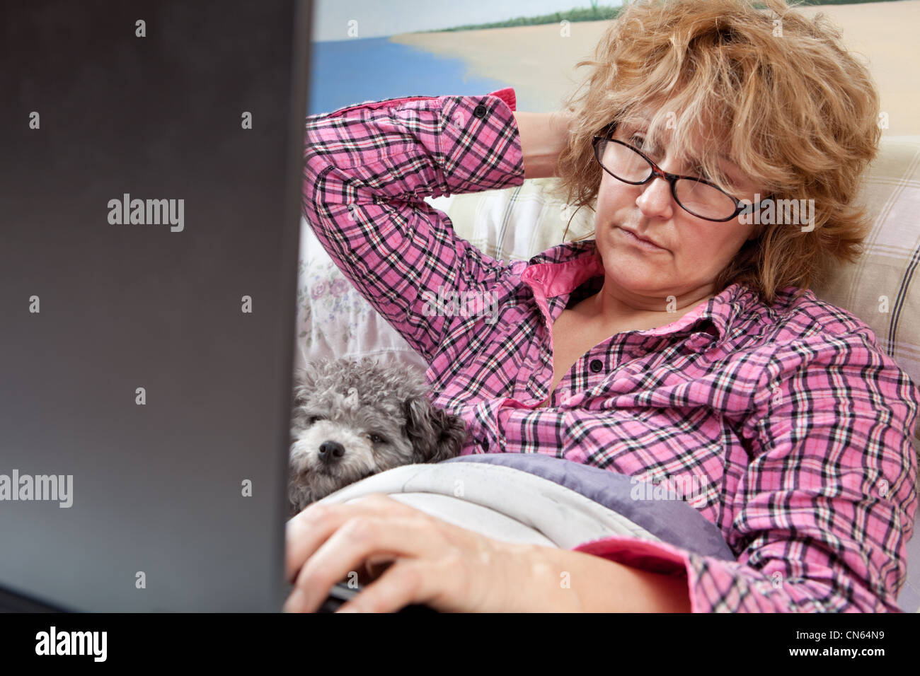 Sick day, businesswoman working from home Stock Photo - Alamy