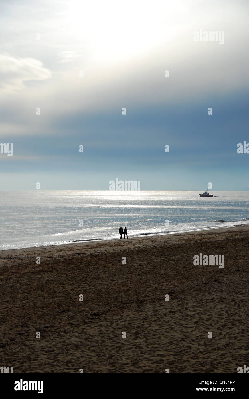 A stroll along the beach Stock Photo - Alamy