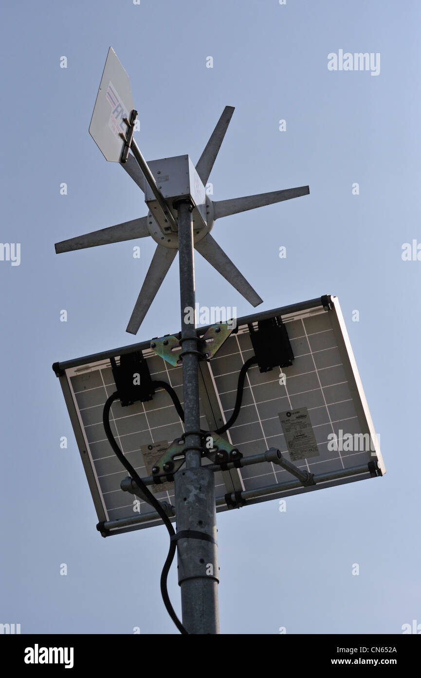 Solar panel and wind turbine powering a road sign. Kirkstone Pass, Lake ...