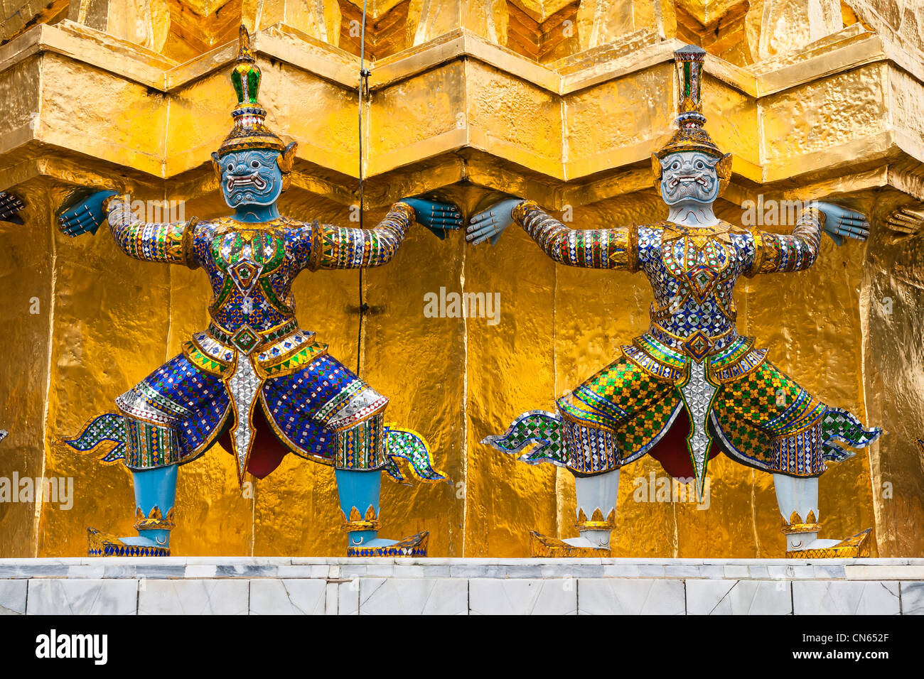 Angel demon on golden wall in clear sky Stock Photo - Alamy
