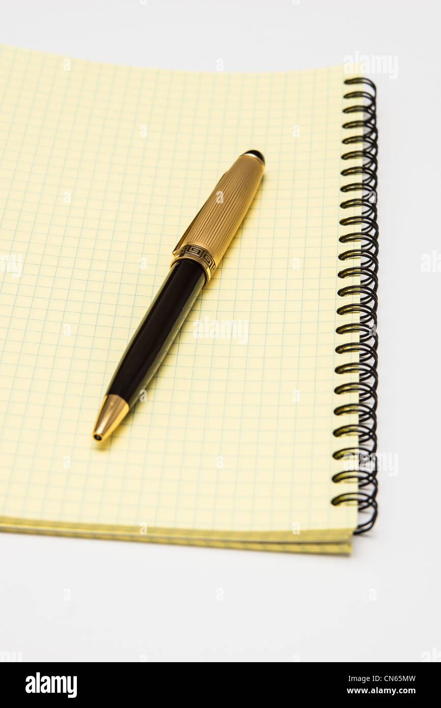 notebook and pen on a white background Stock Photo - Alamy