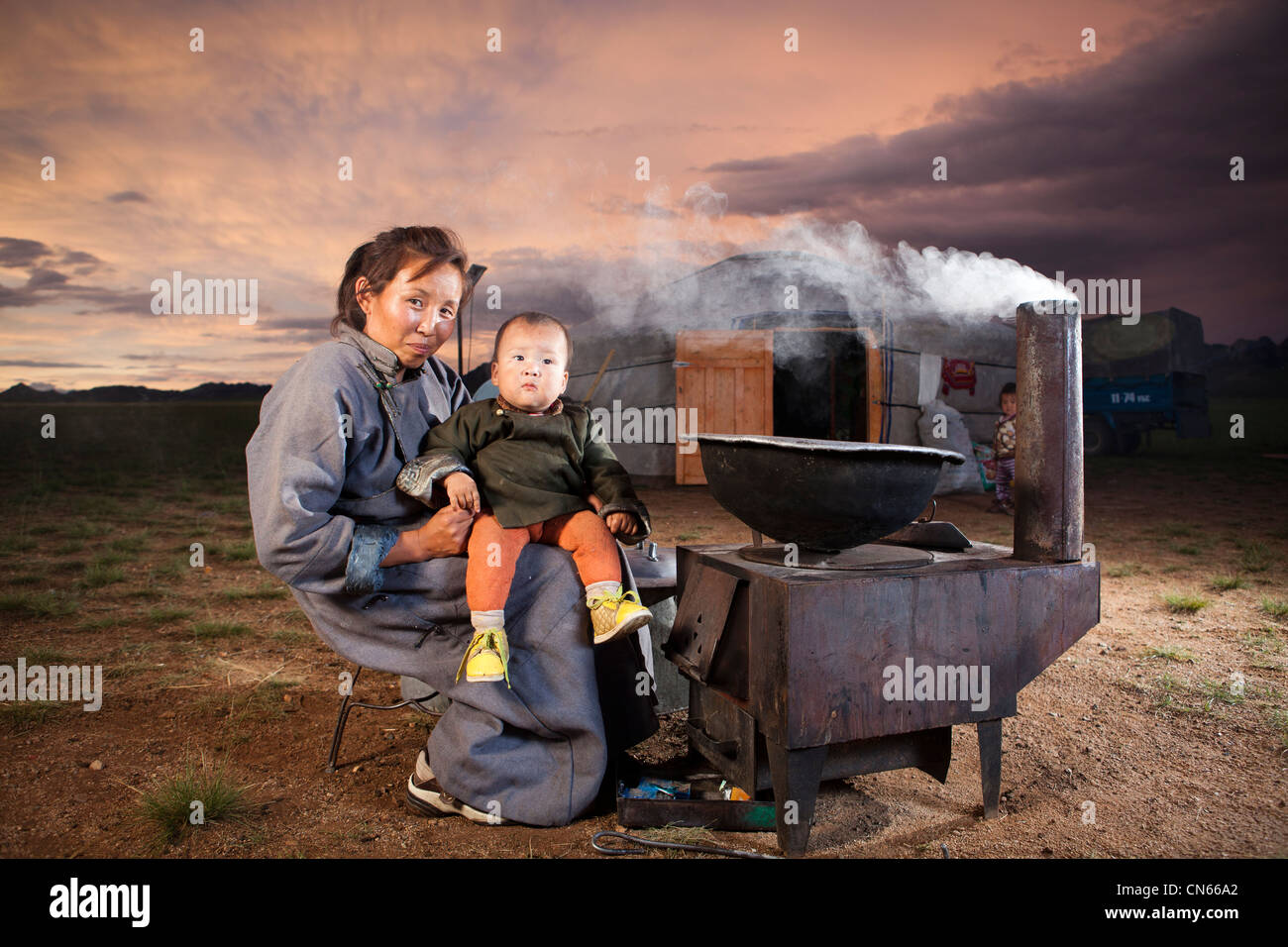 Mongolian woman cooking outside kitchen , Mongolia Stock Photo - Alamy