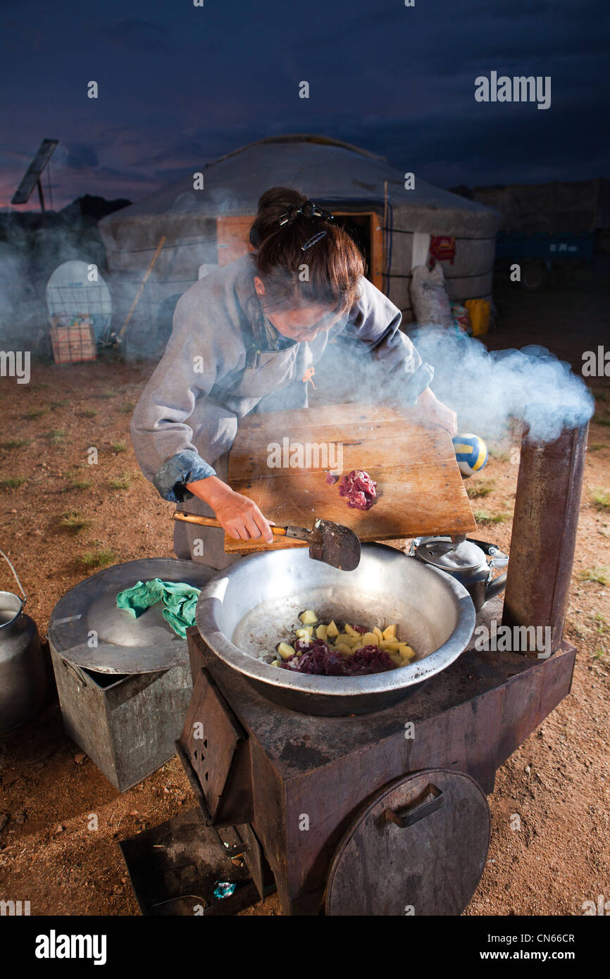 Mongolian woman cooking outside kitchen , Mongolia Stock Photo - Alamy
