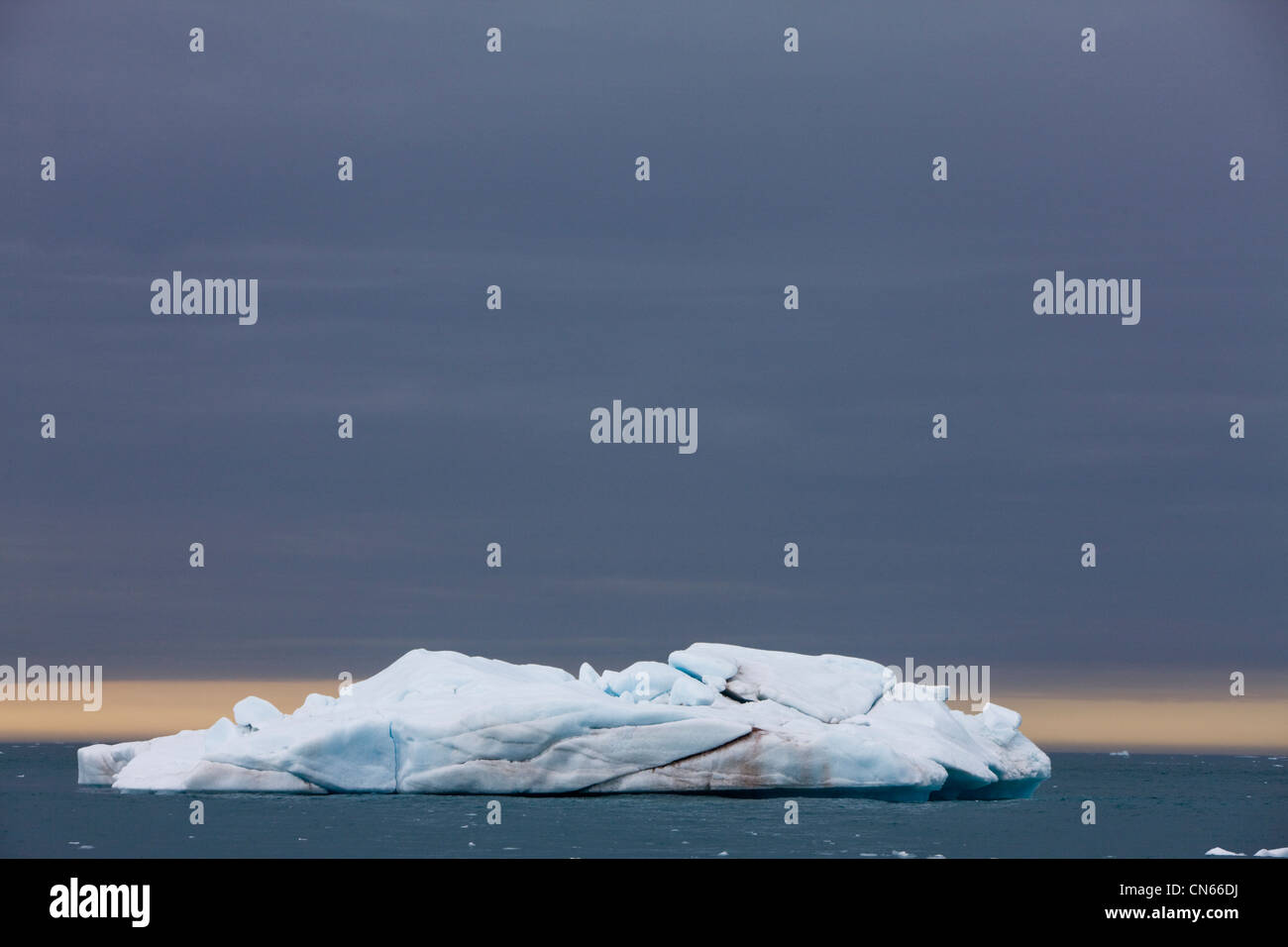 Norway, Svalbard, Nordaustlandet, Iceberg floating near face of ...