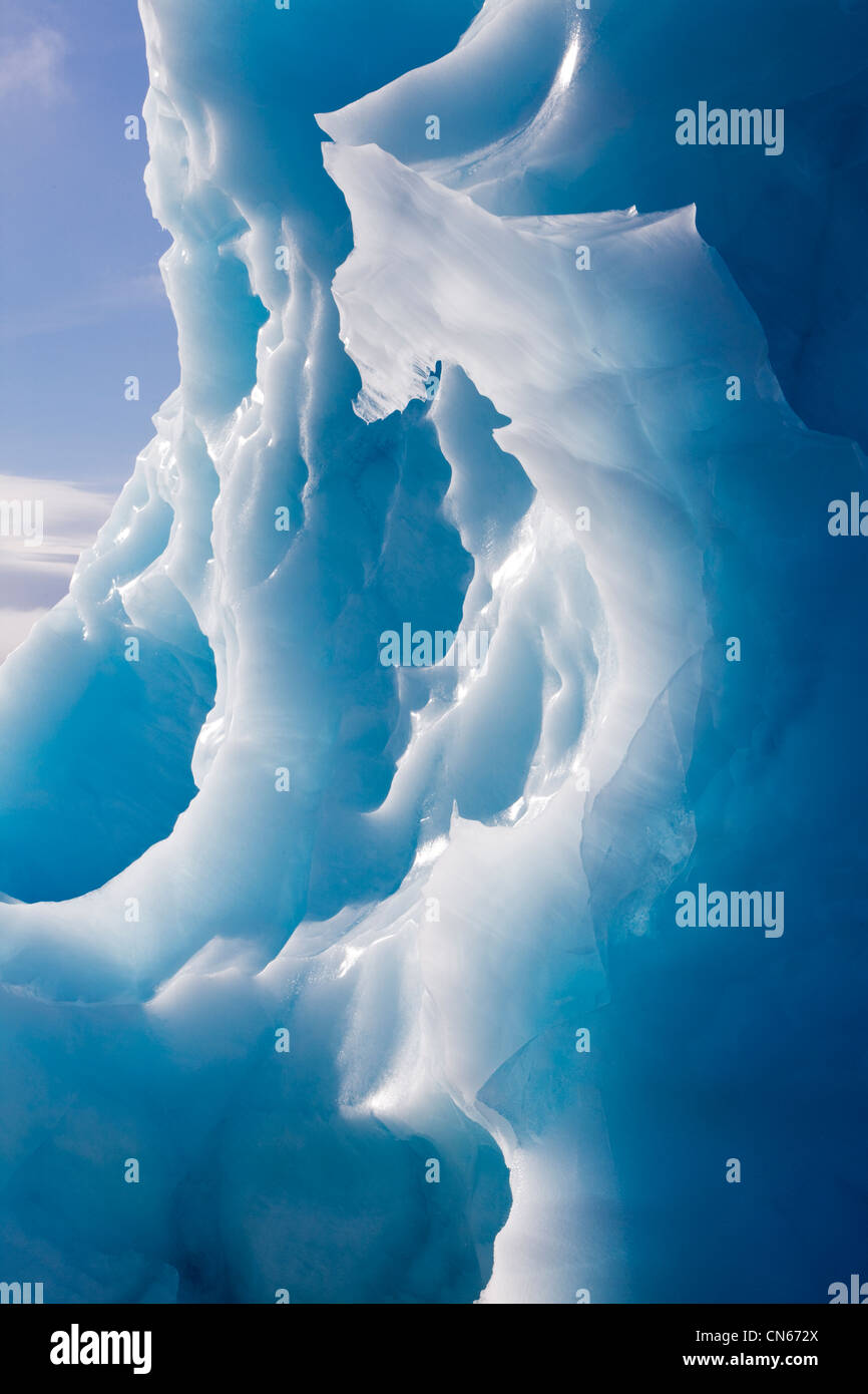 Norway, Svalbard, Nordaustlandet, Deep blue iceberg floating in ...