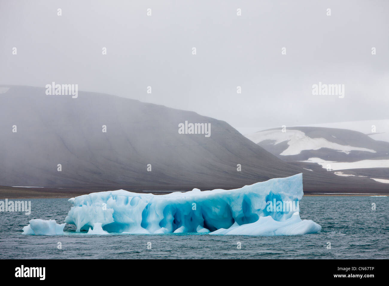 Norway, Svalbard, Edgeoya Island, Iceberg floating in North Atlantic on ...