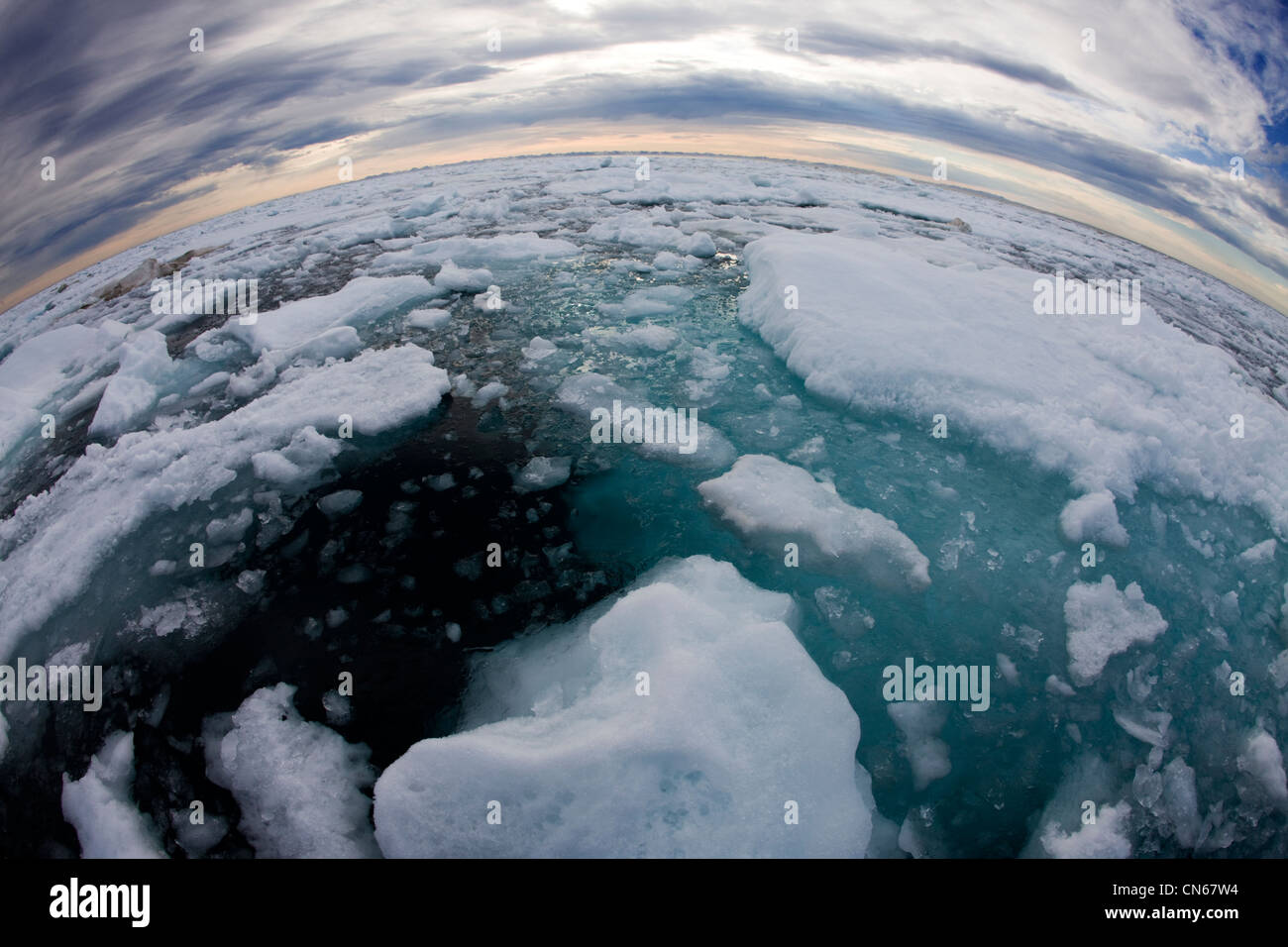 Norway, Svalbard, Edgeoya Island, Storm clouds above first year sea Ice ...