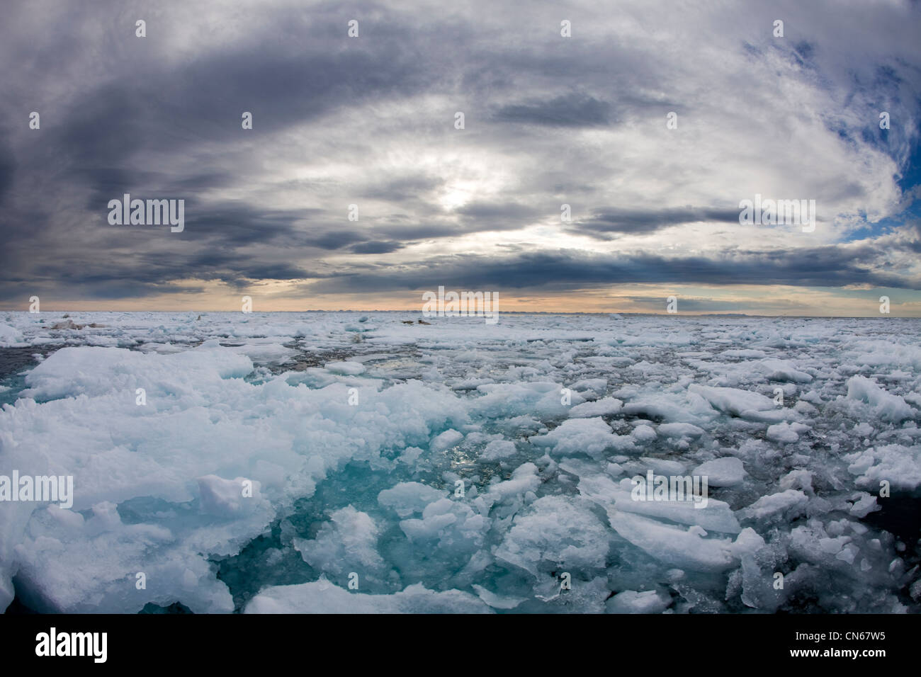 Norway, Svalbard, Edgeoya Island, Storm clouds above first year sea Ice ...