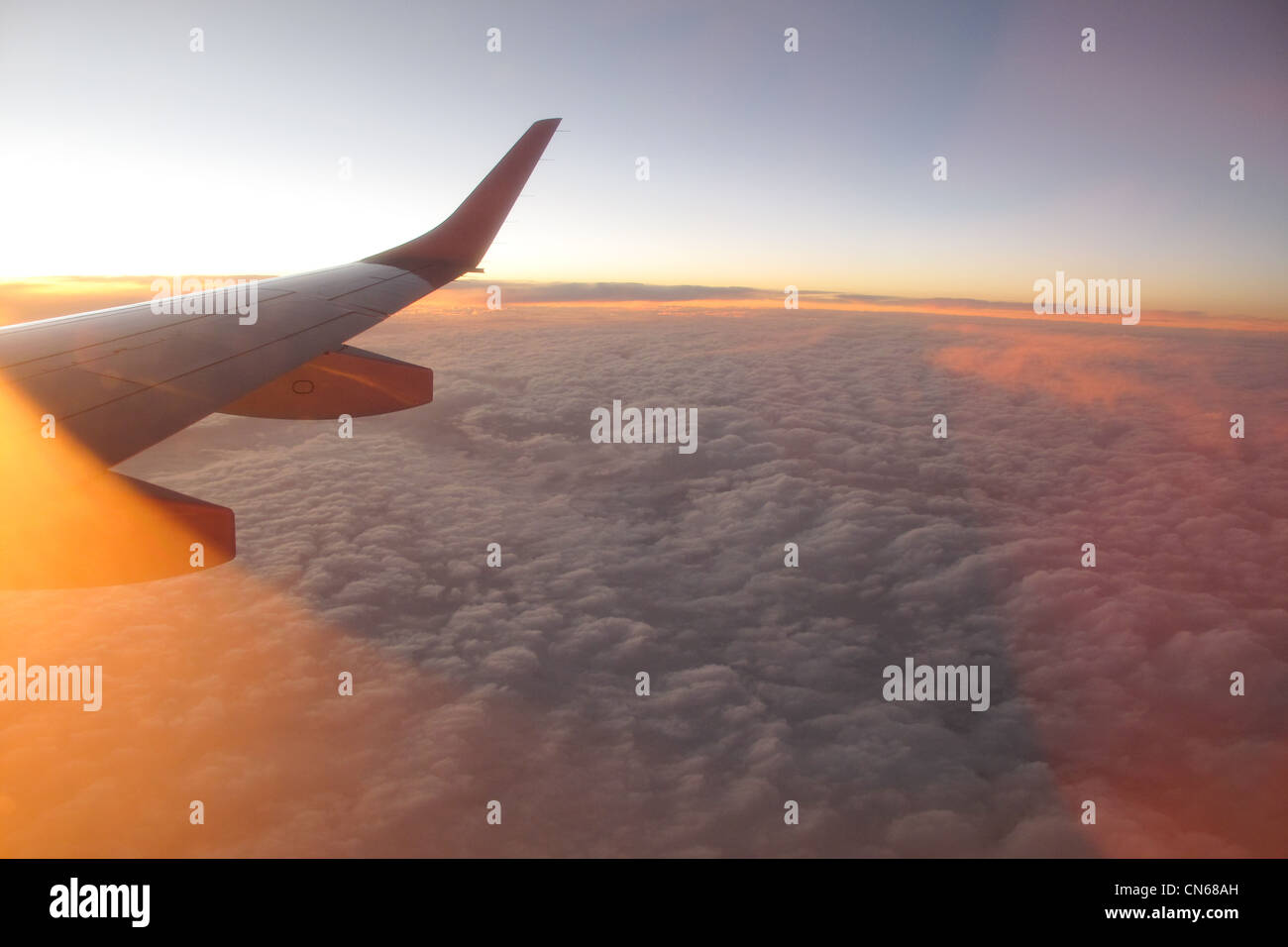 Clouds from a jet Stock Photo - Alamy