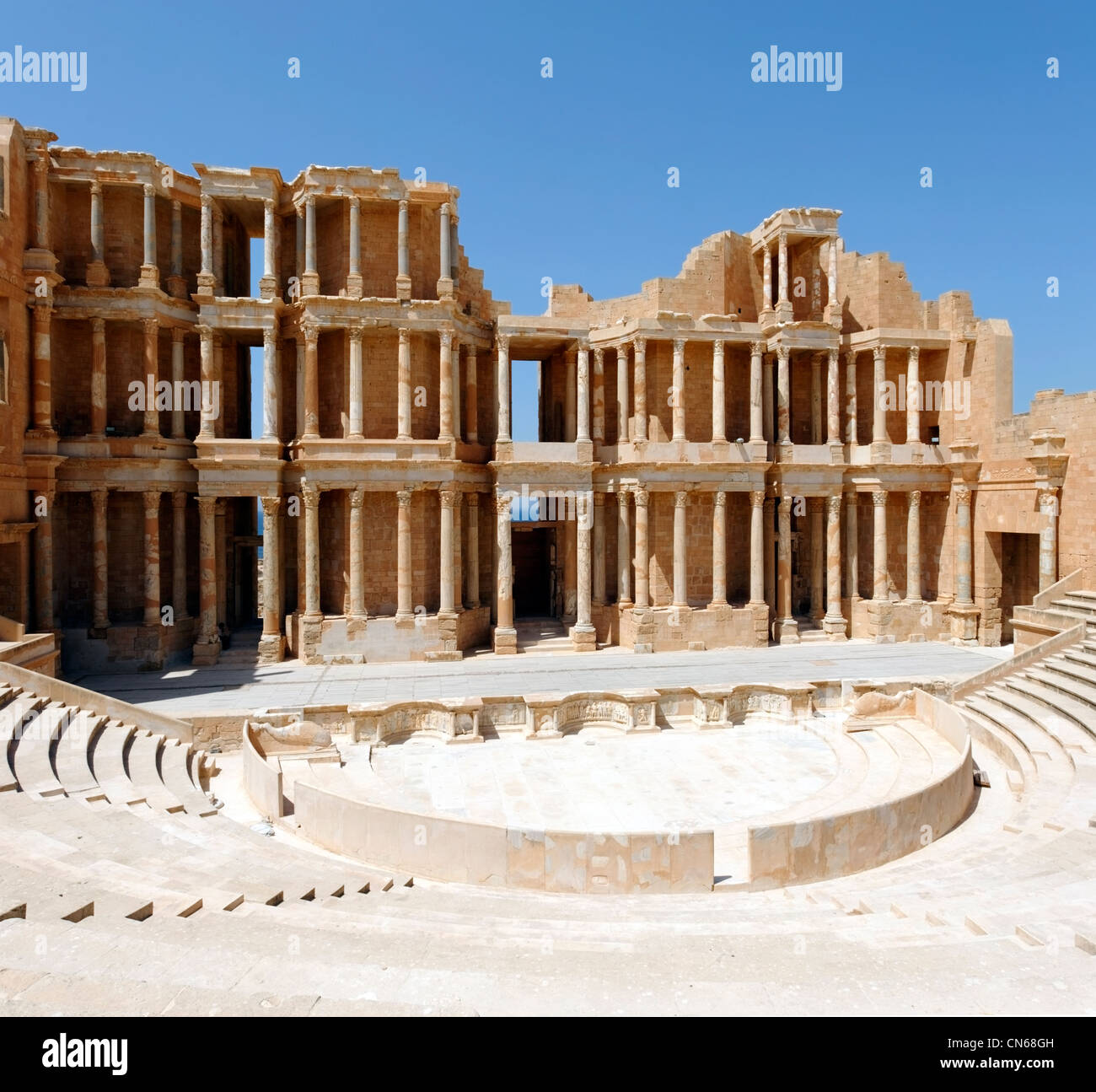 The stage building, orchestra section and semicircular cavea or ...
