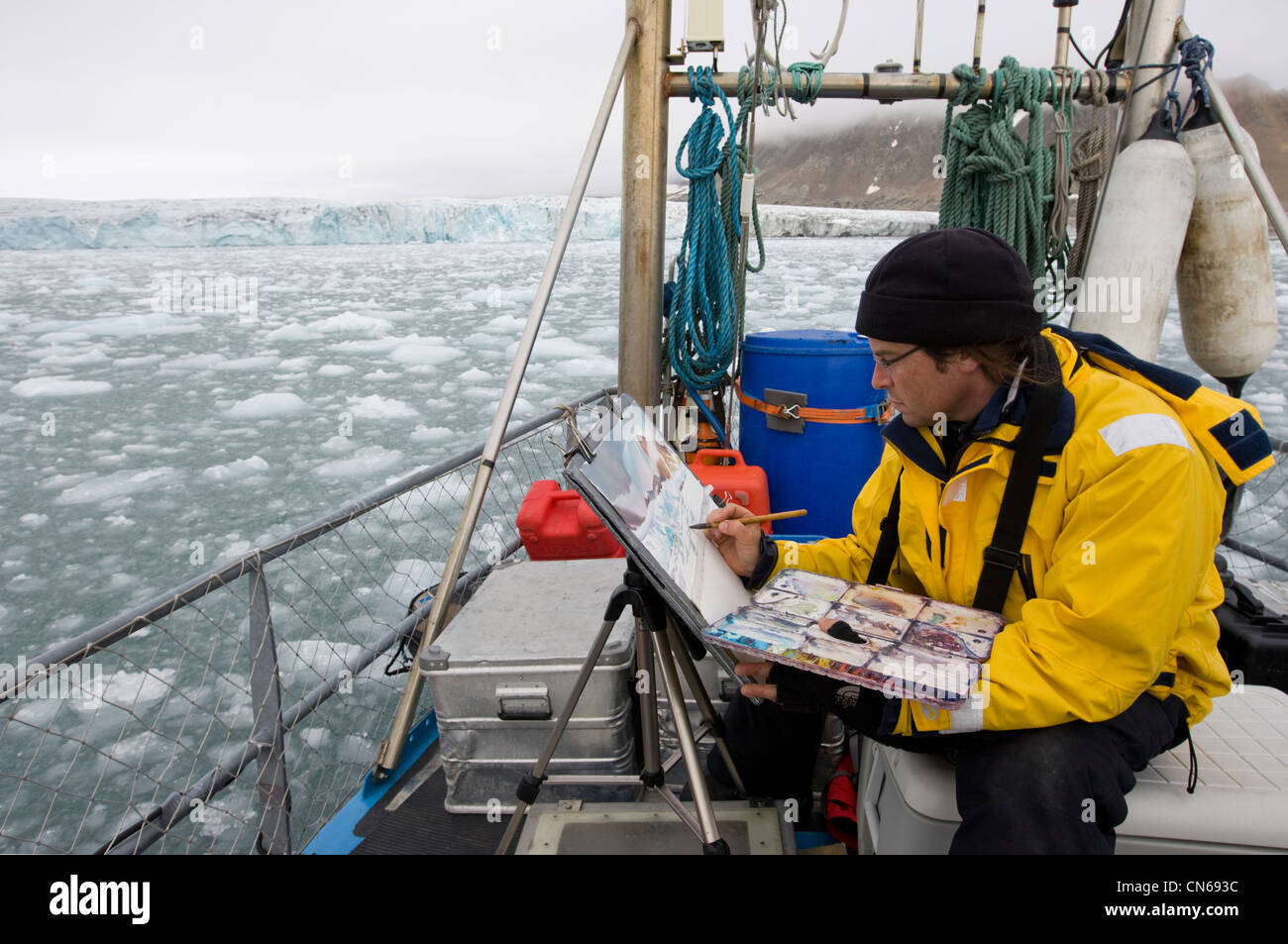 Norway, Svalbard, Spitsbergen Island, Artist painting watercolor ...