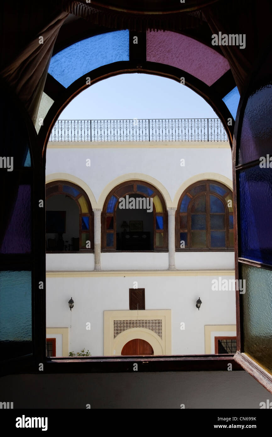 Tripoli. Libya. View of arched coloured windows from the Old French ...