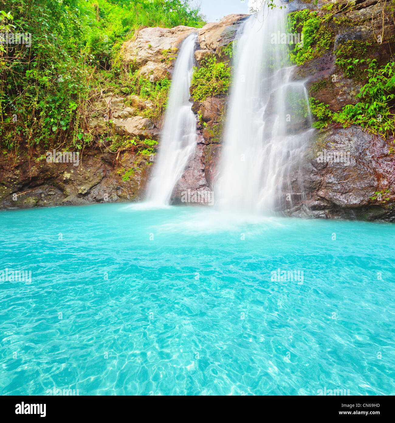Beautiful waterfall at summer sunny day Stock Photo - Alamy