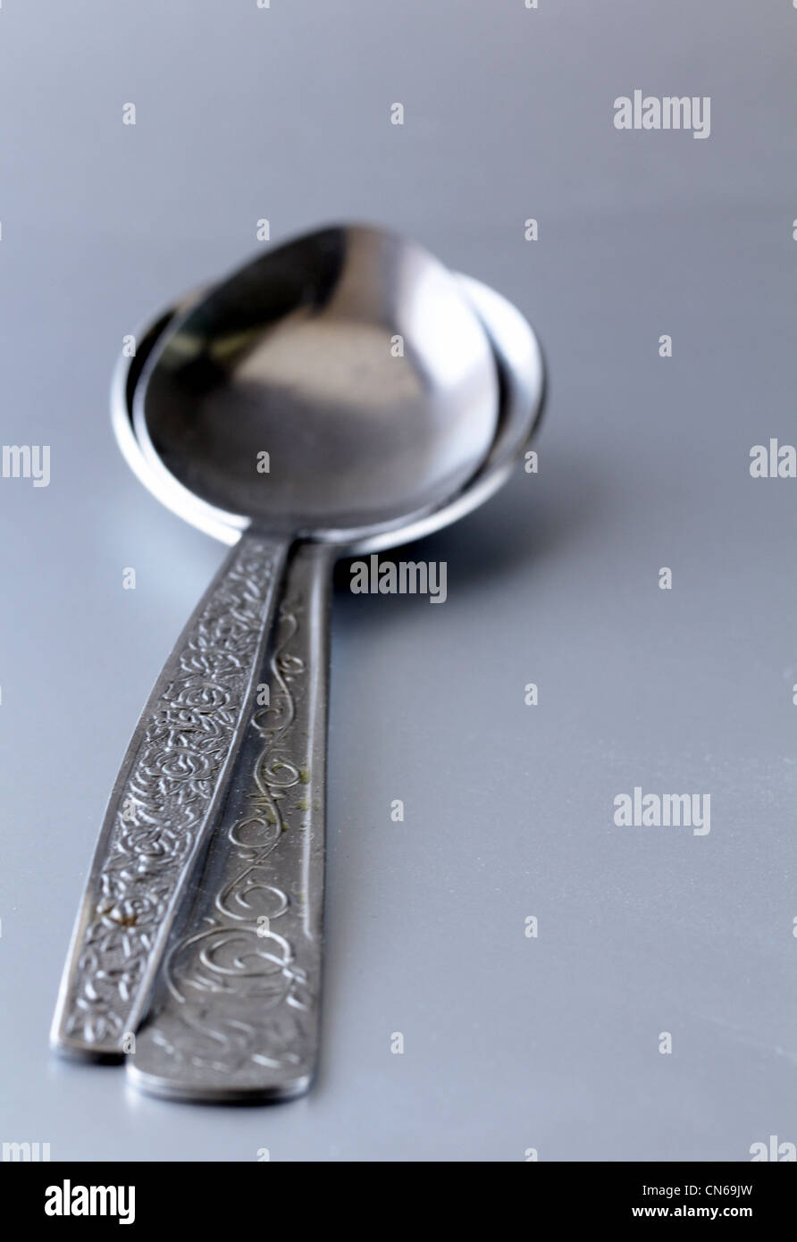 Tarnished spoons hi-res stock photography and images - Alamy