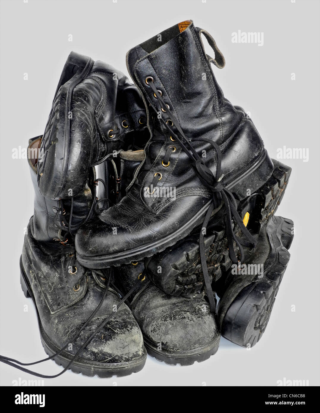 A pile of old boots Stock Photo - Alamy