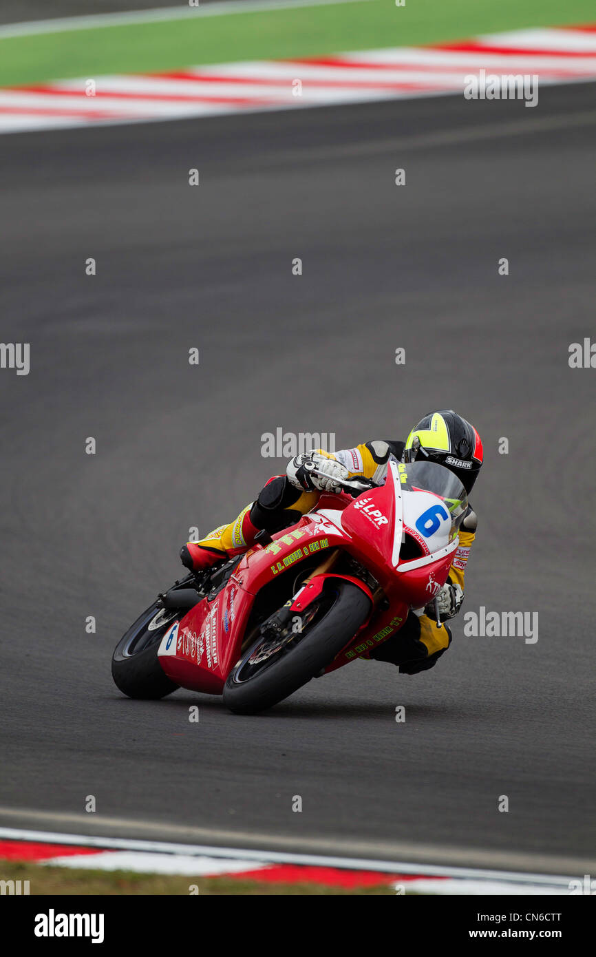 road motorbike action going around race track Stock Photo - Alamy