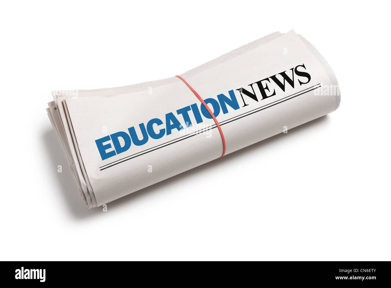 Education News, Newspaper roll with white background Stock Photo - Alamy