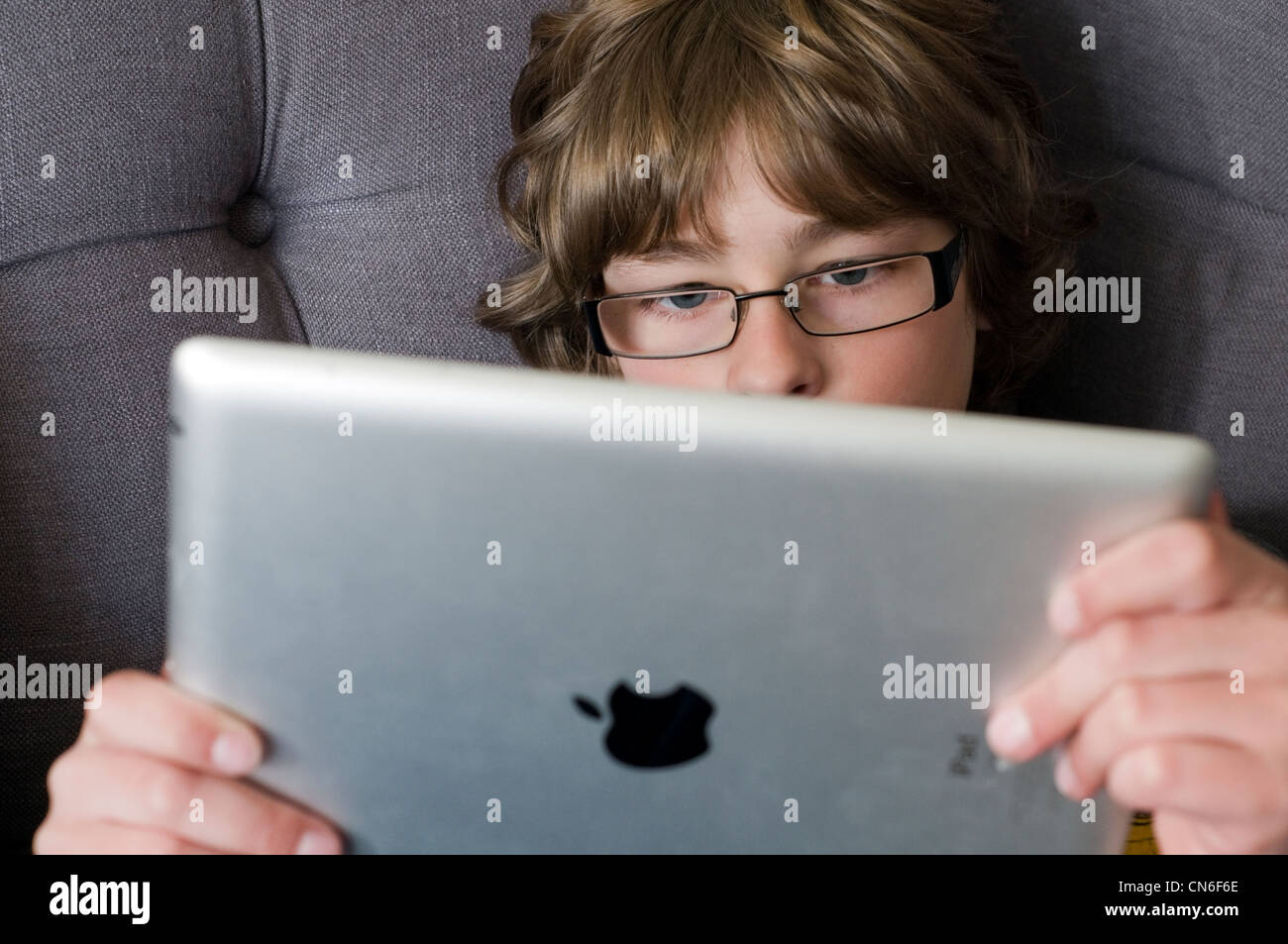 Child playing with ipad hi-res stock photography and images - Alamy