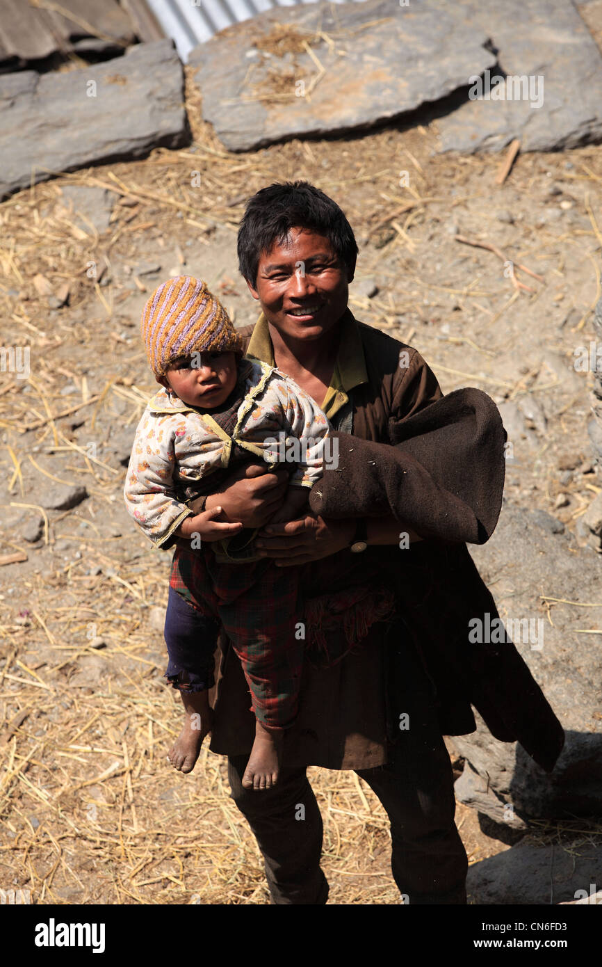Nepali man with little girl Nepal Stock Photo - Alamy