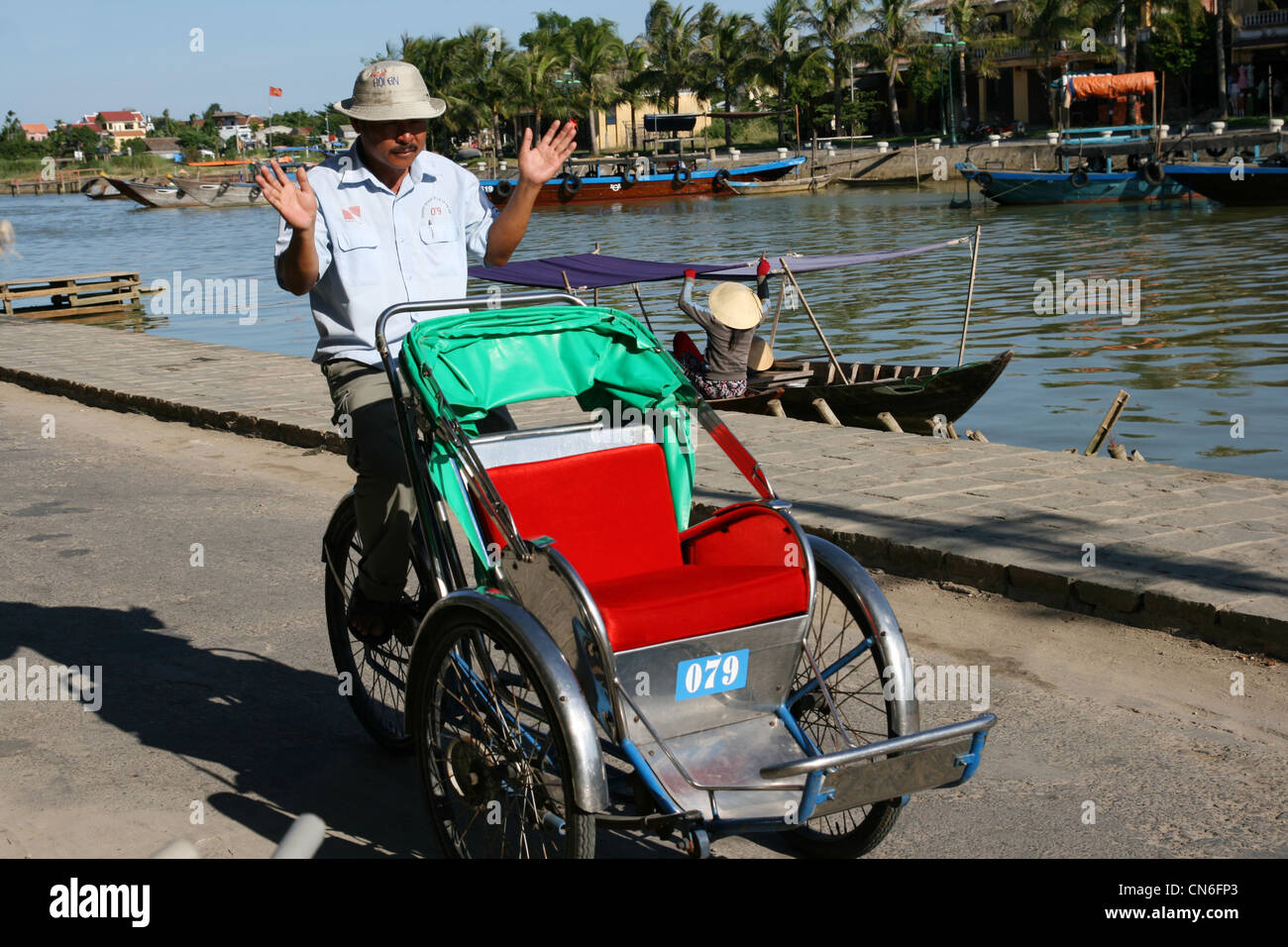Cyclo driver in Hoi An, Vietnam Stock Photo - Alamy