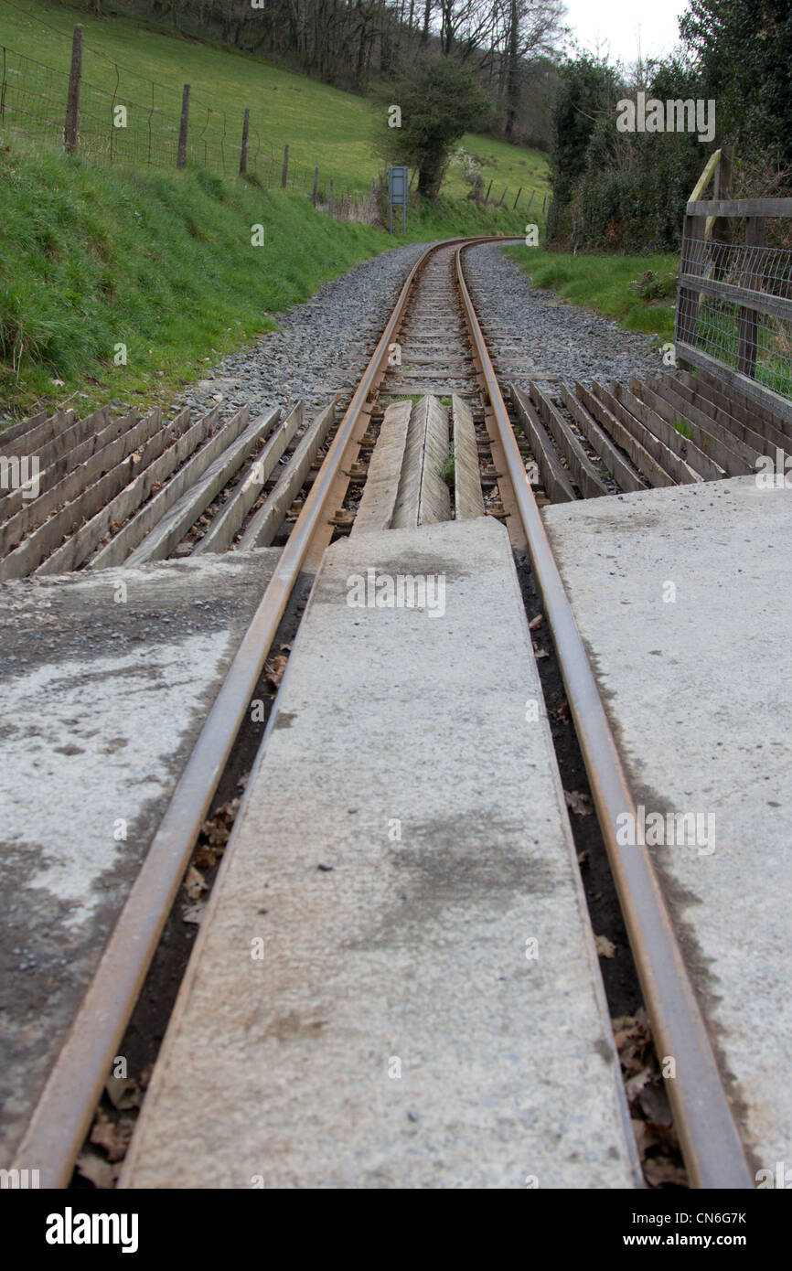 Narrow gauge railway track heading towards a bend in the distance Stock ...