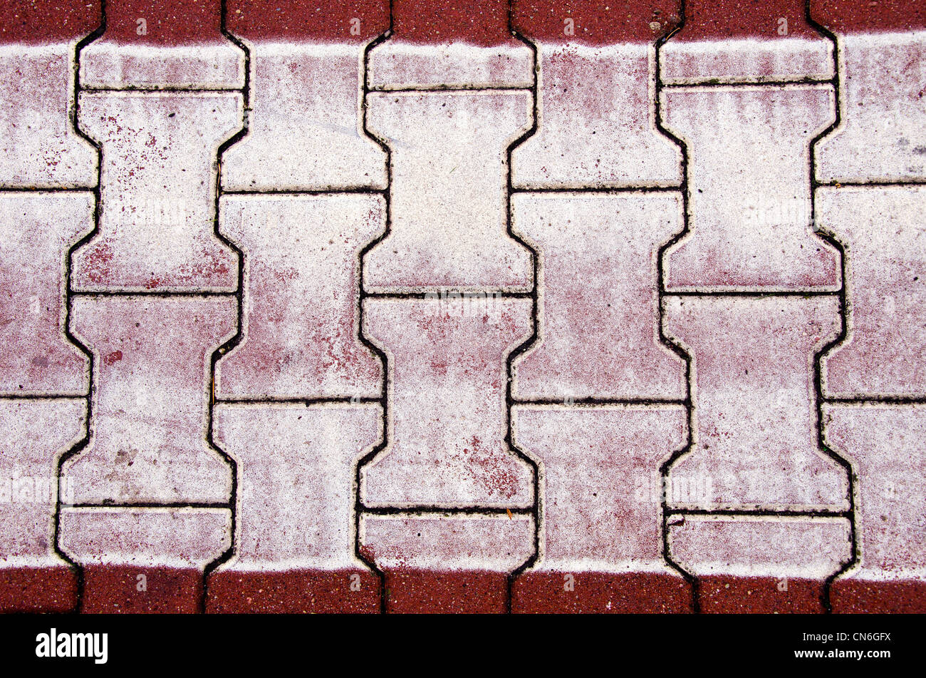 background of city street bricks. pedestrian crossing markings on road ...