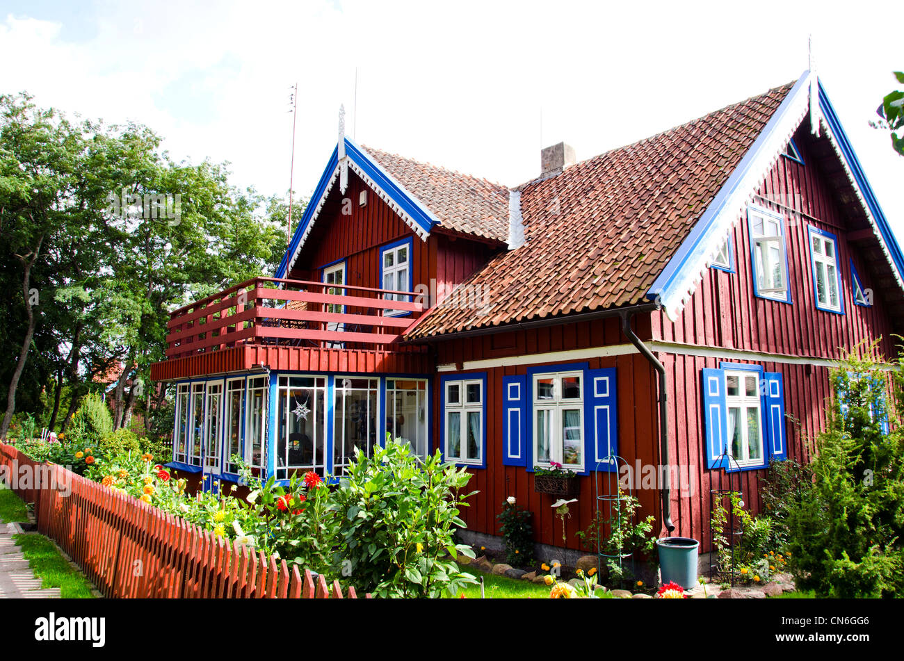 homestead house. colorful rural architecture and neat garden courtyard ...