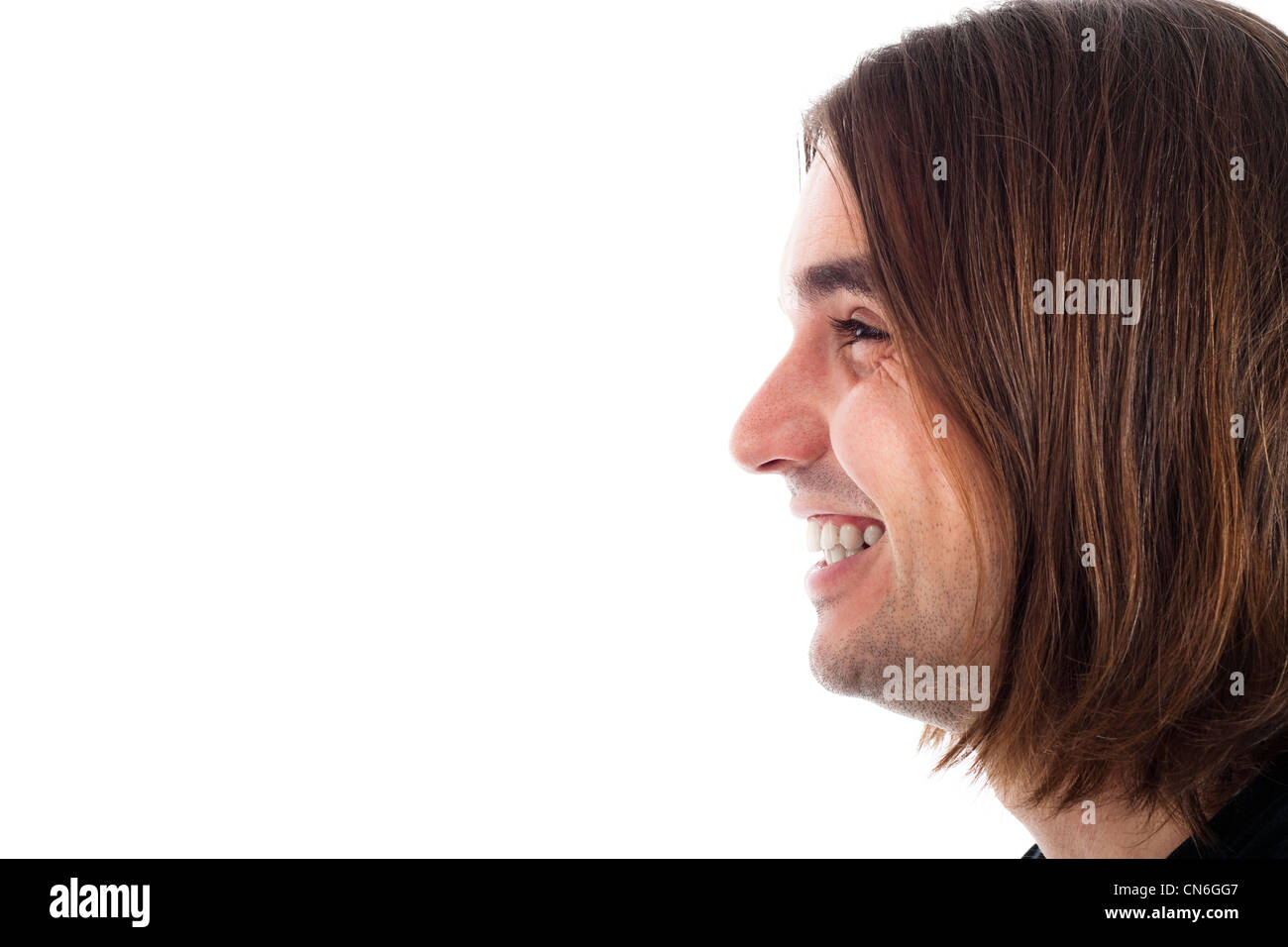 Profile of young long haired happy man face laughing, isolated on white ...
