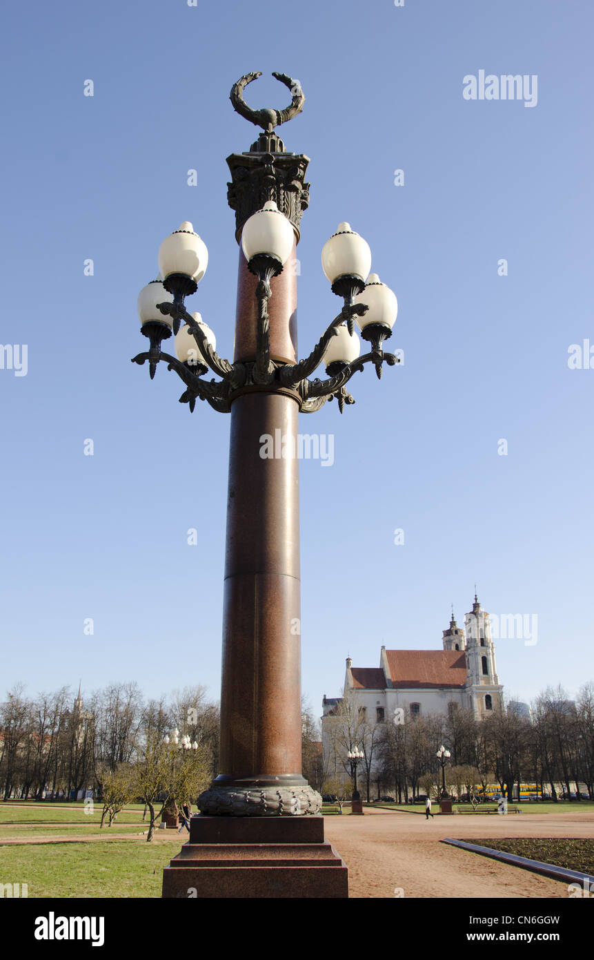 park decorative antique lamp in center of city lukiskes square. church ...