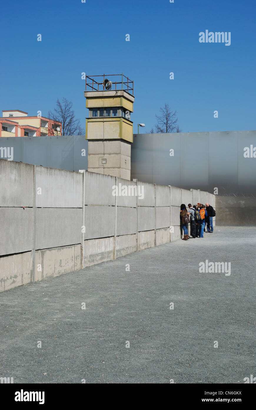 A section of the inner wall and watchtower at the Berlin Wall Memorial ...