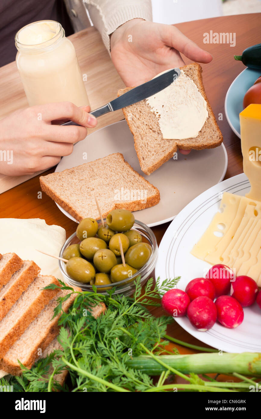 Spreading mayo on bread hi-res stock photography and images - Alamy