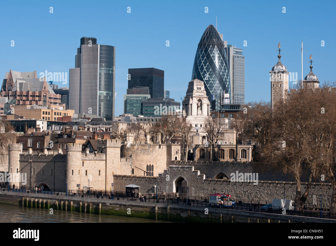 The Tower of London with the modern skyscrapers of the City of London ...