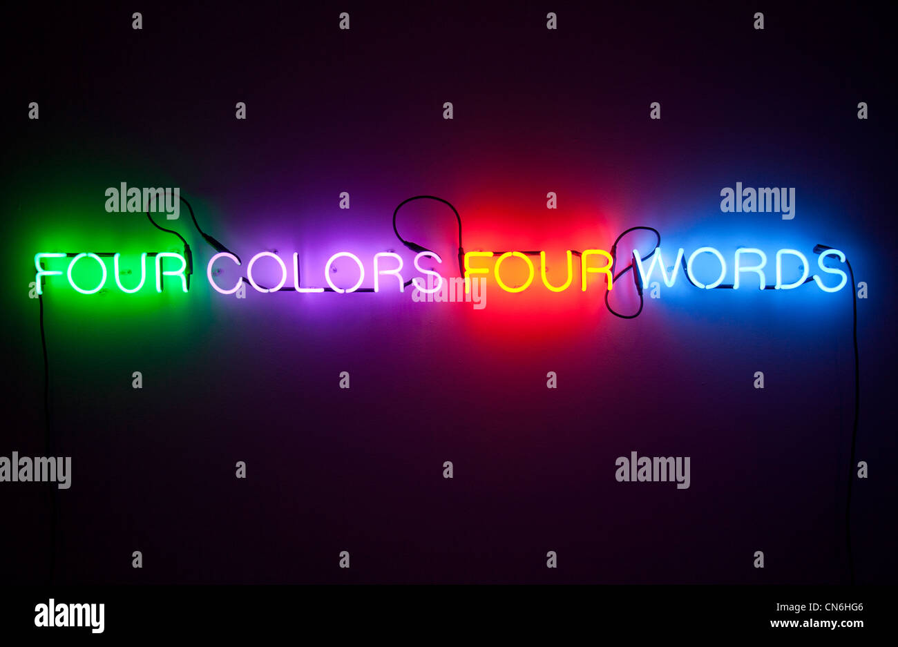four colors four words neon sign Stock Photo - Alamy