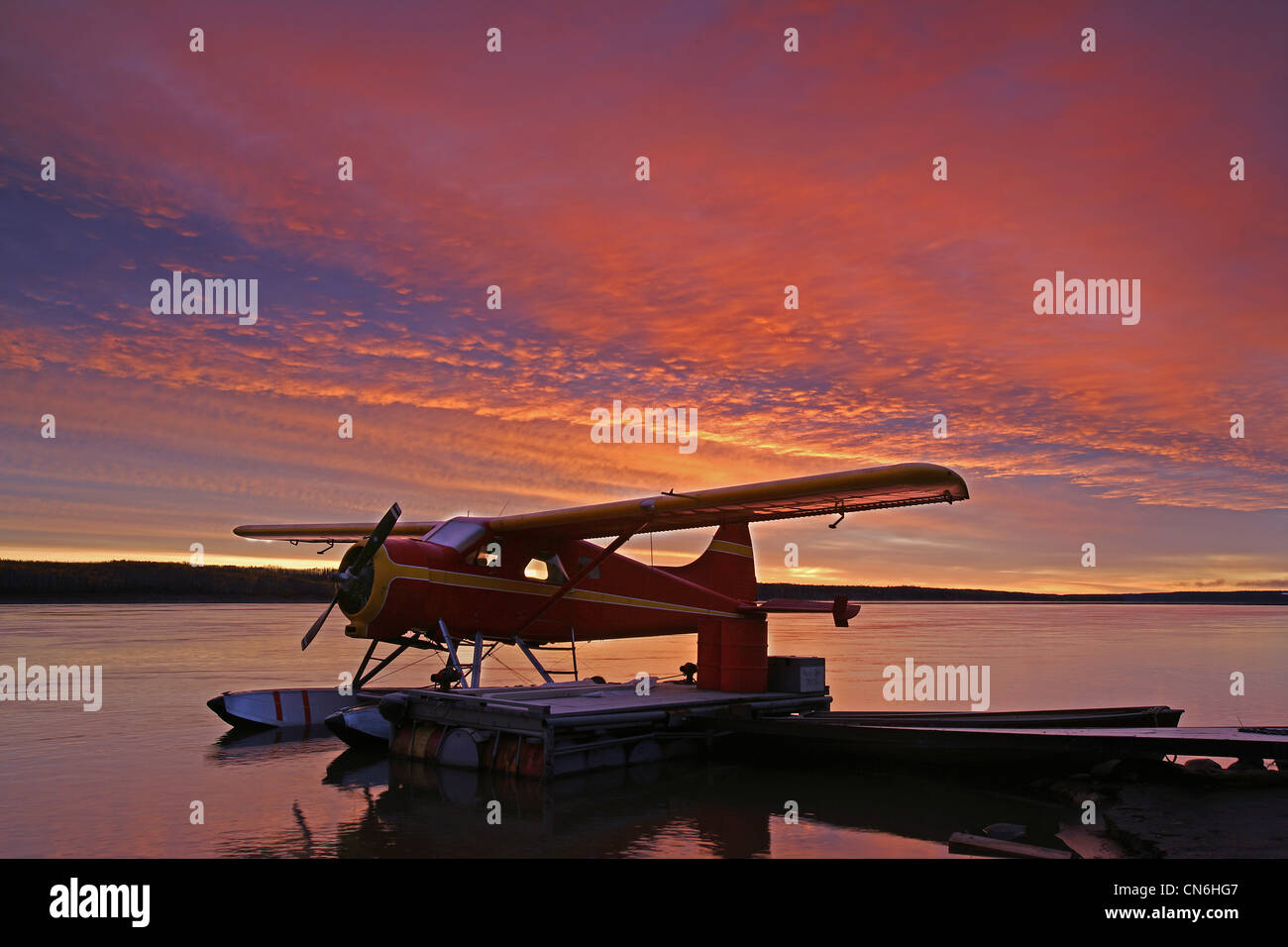Floatplane in Sunset over the MacKenzie River, Fort Simpson, Northwest ...