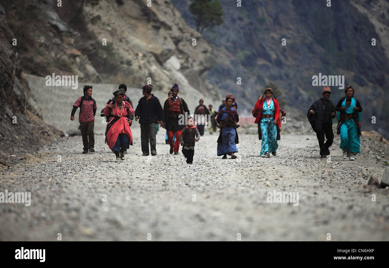 Nepali rural Tamang people walking on a road Nepal Stock Photo - Alamy