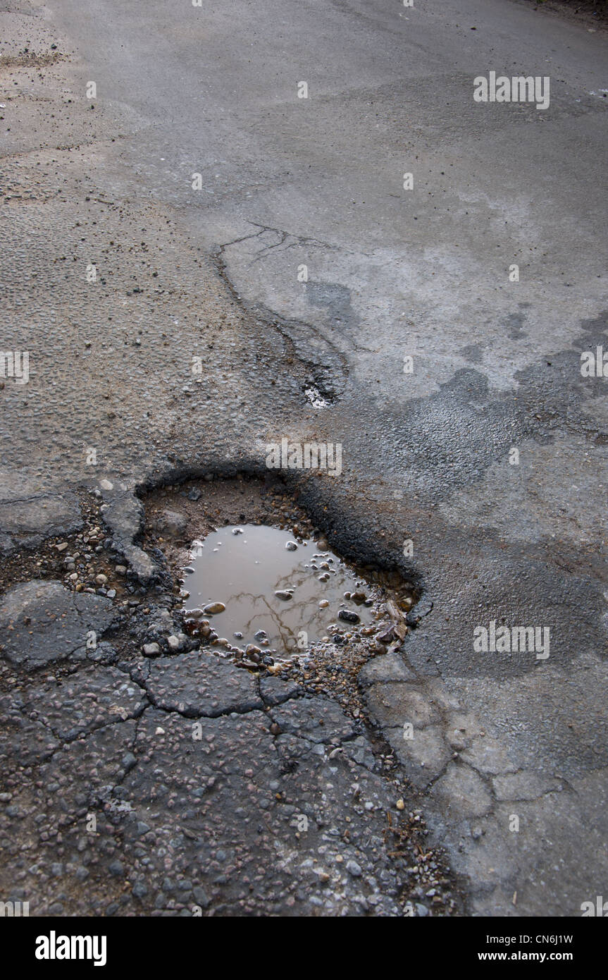 Hole in the road hi-res stock photography and images - Alamy