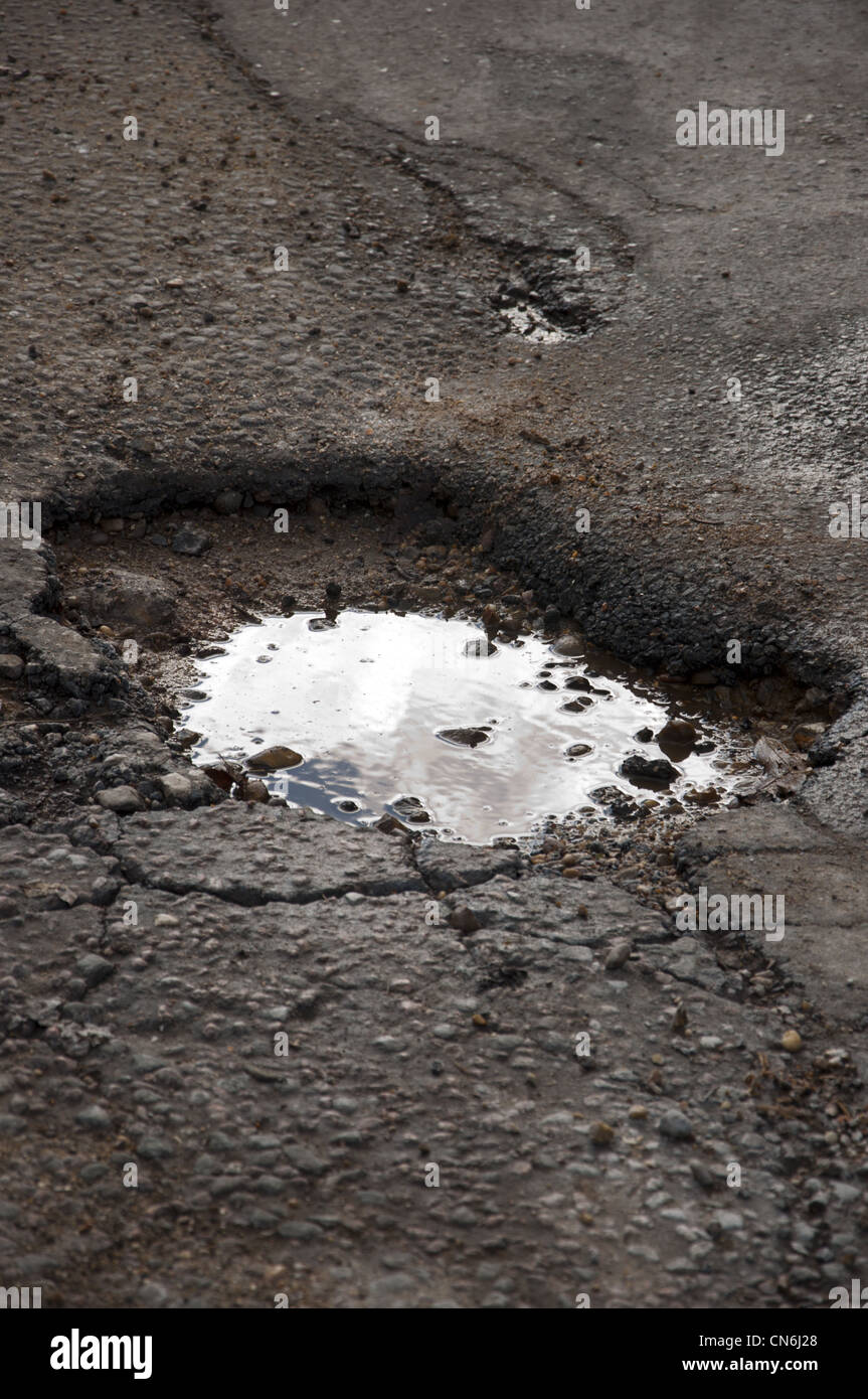 Hole in the road hi-res stock photography and images - Alamy