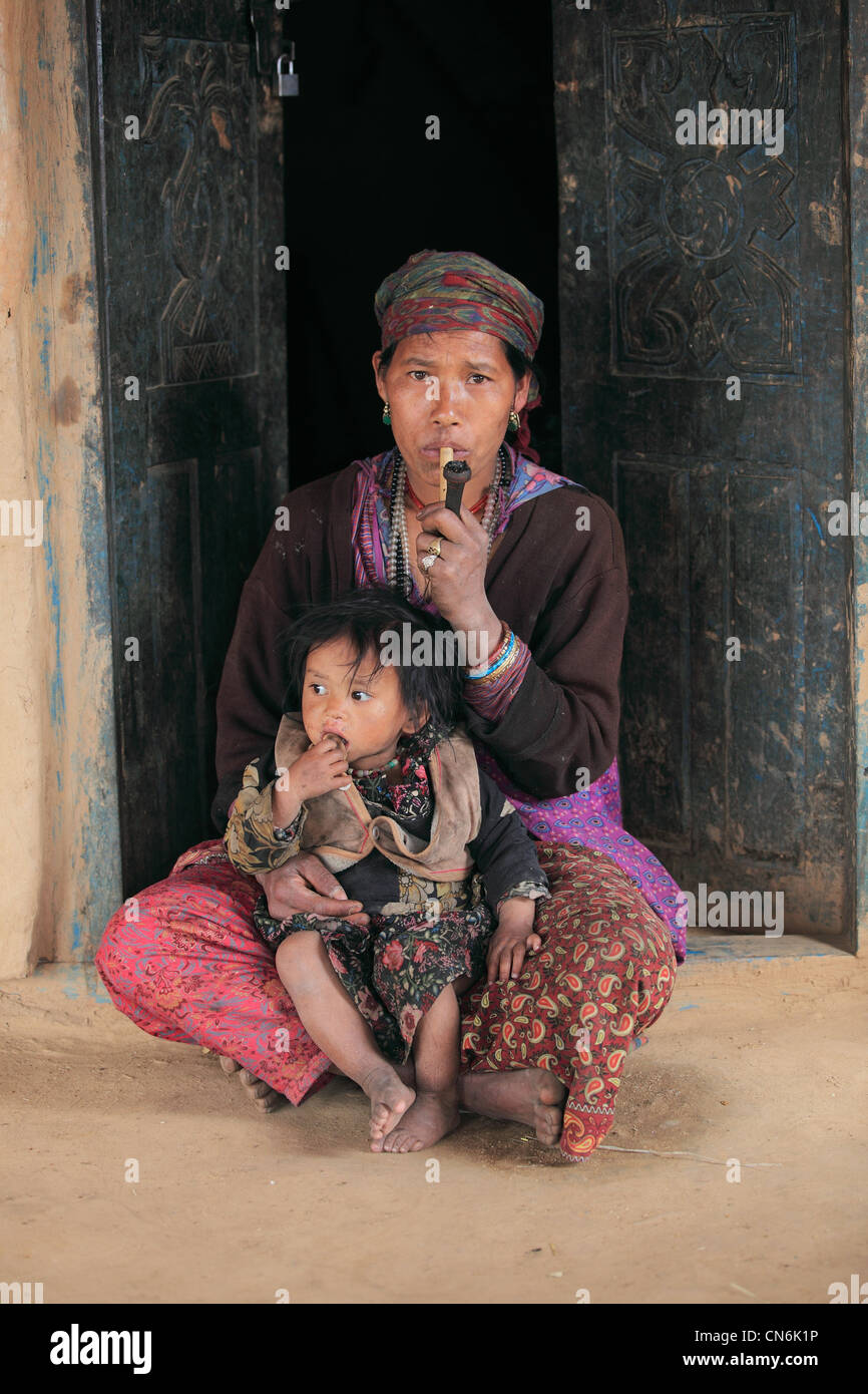 Nepali rural Tamang woman with child Nepal Stock Photo - Alamy