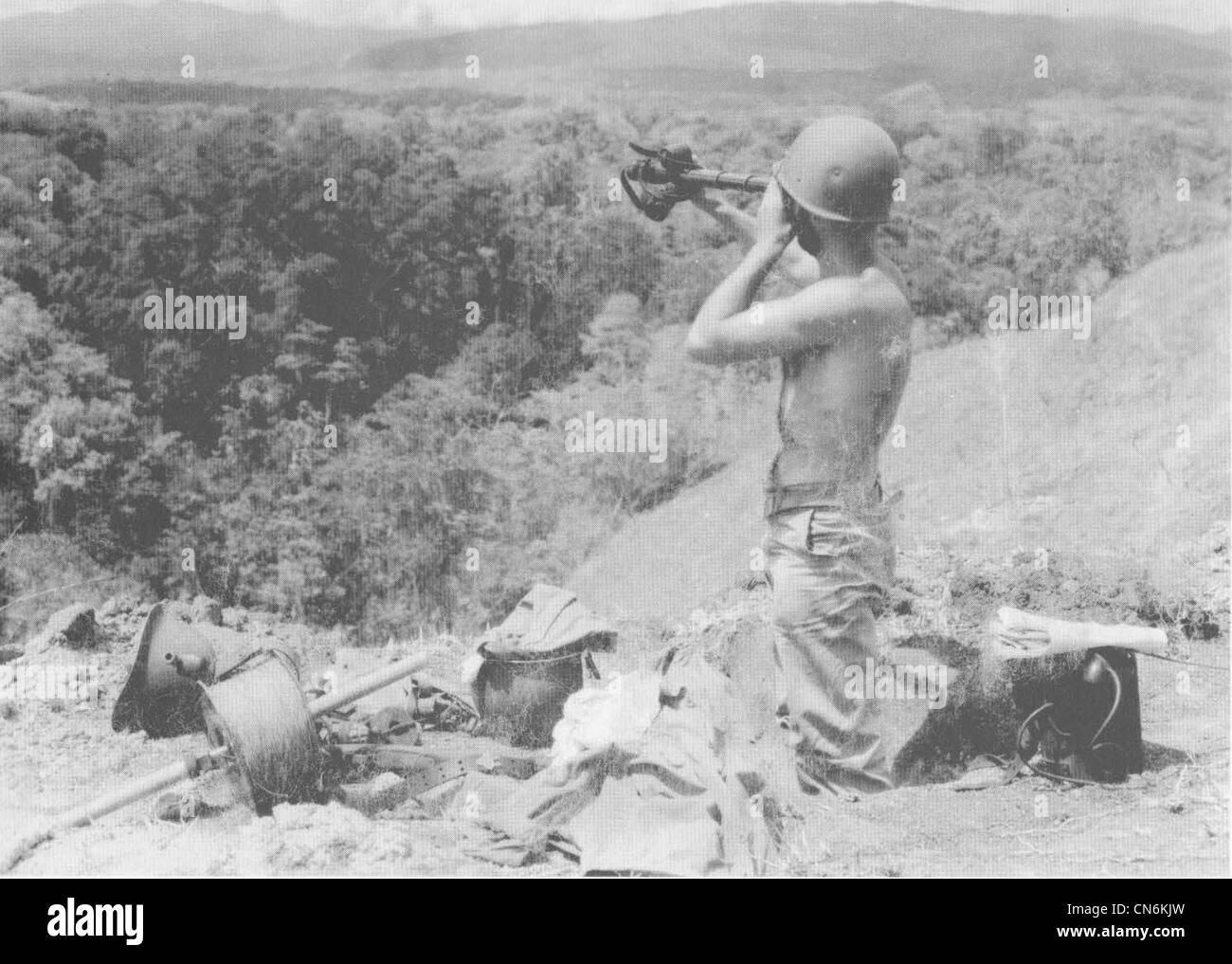 A U.S. Marine guards Hill 80 on "Edson's" Ridge, Guadalcanal in 1942 ...