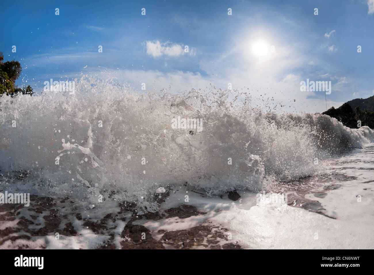 Big wave front with bubbles and splashes closeup view Stock Photo - Alamy