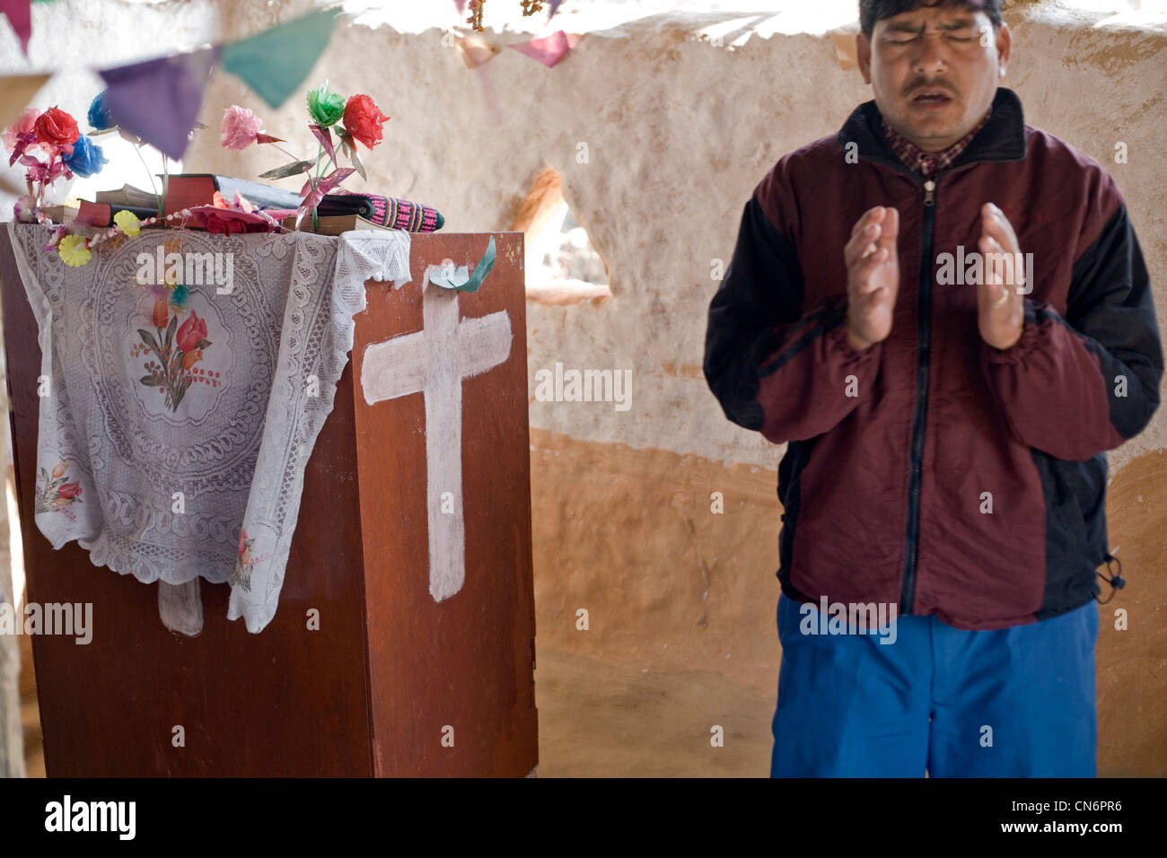 Nepali Christian pastor conducting a mass at Chisopani in Western Nepal ...
