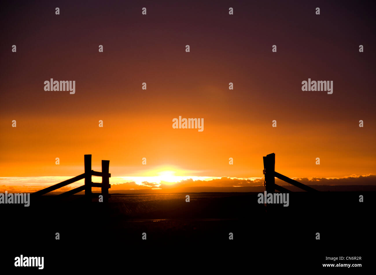 Sunrise over the marshes at Elmley Marshes Nature Reserve on the Isle ...