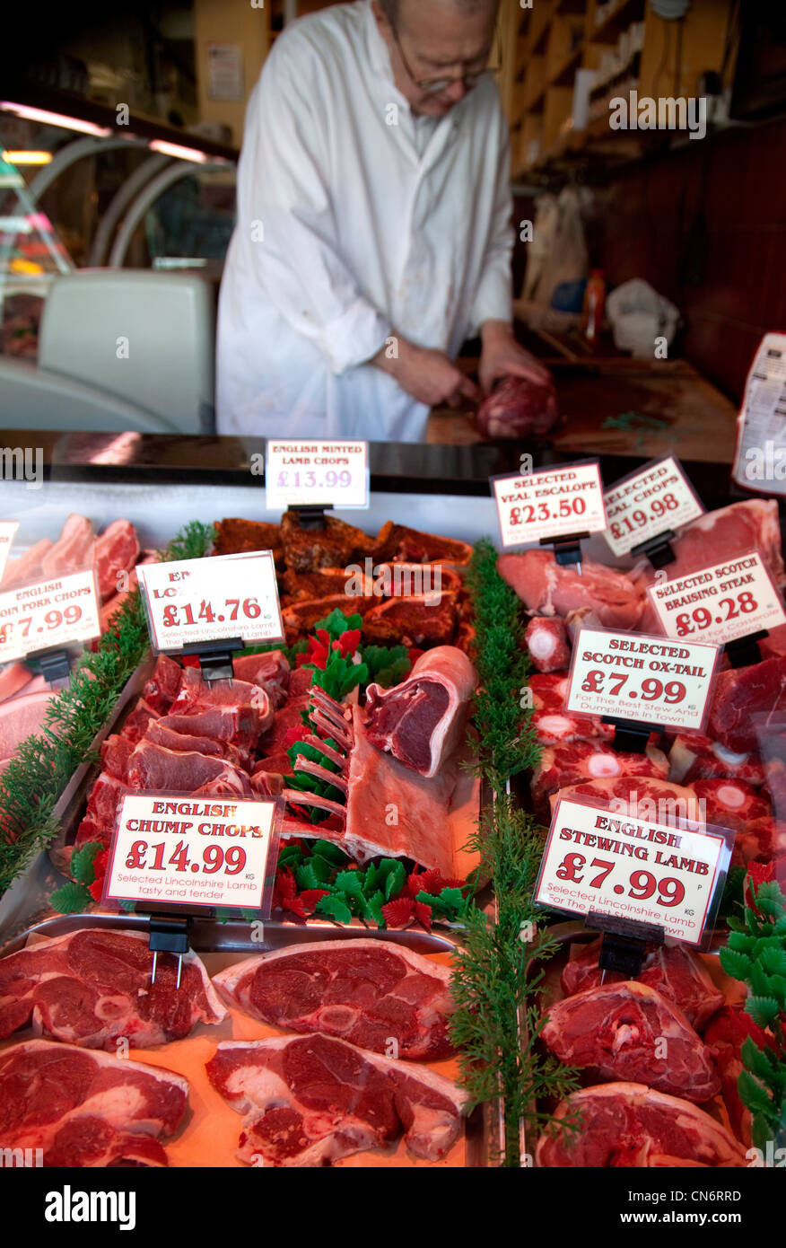Red meat displayed in London butcher's shop window Stock Photo - Alamy