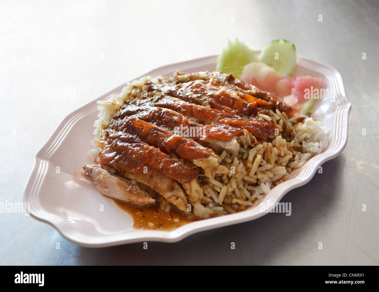 roast duck over rice served with vegetable Stock Photo - Alamy
