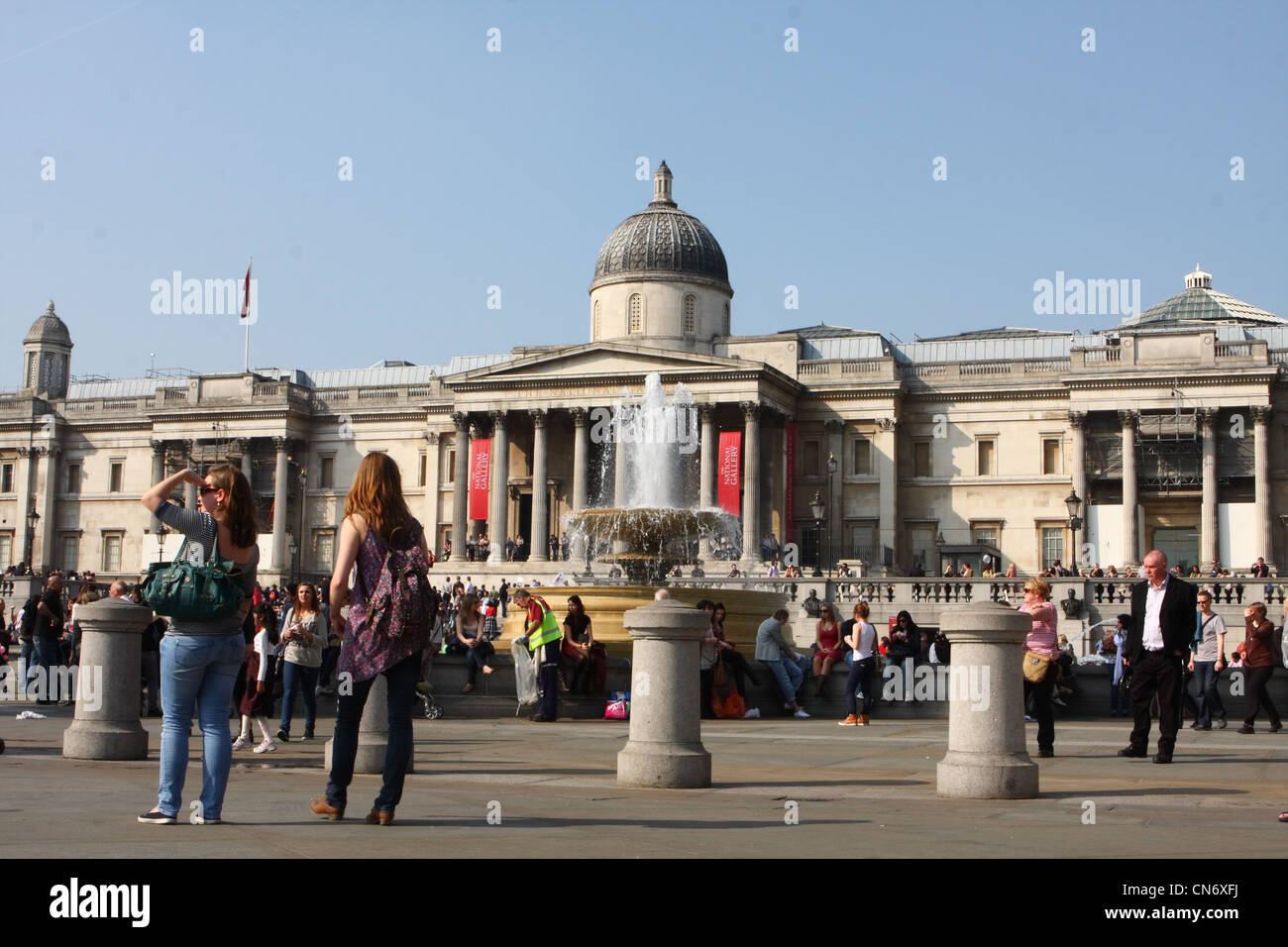 people in Trafalgar Square, London, on a sunny spring day Stock Photo ...