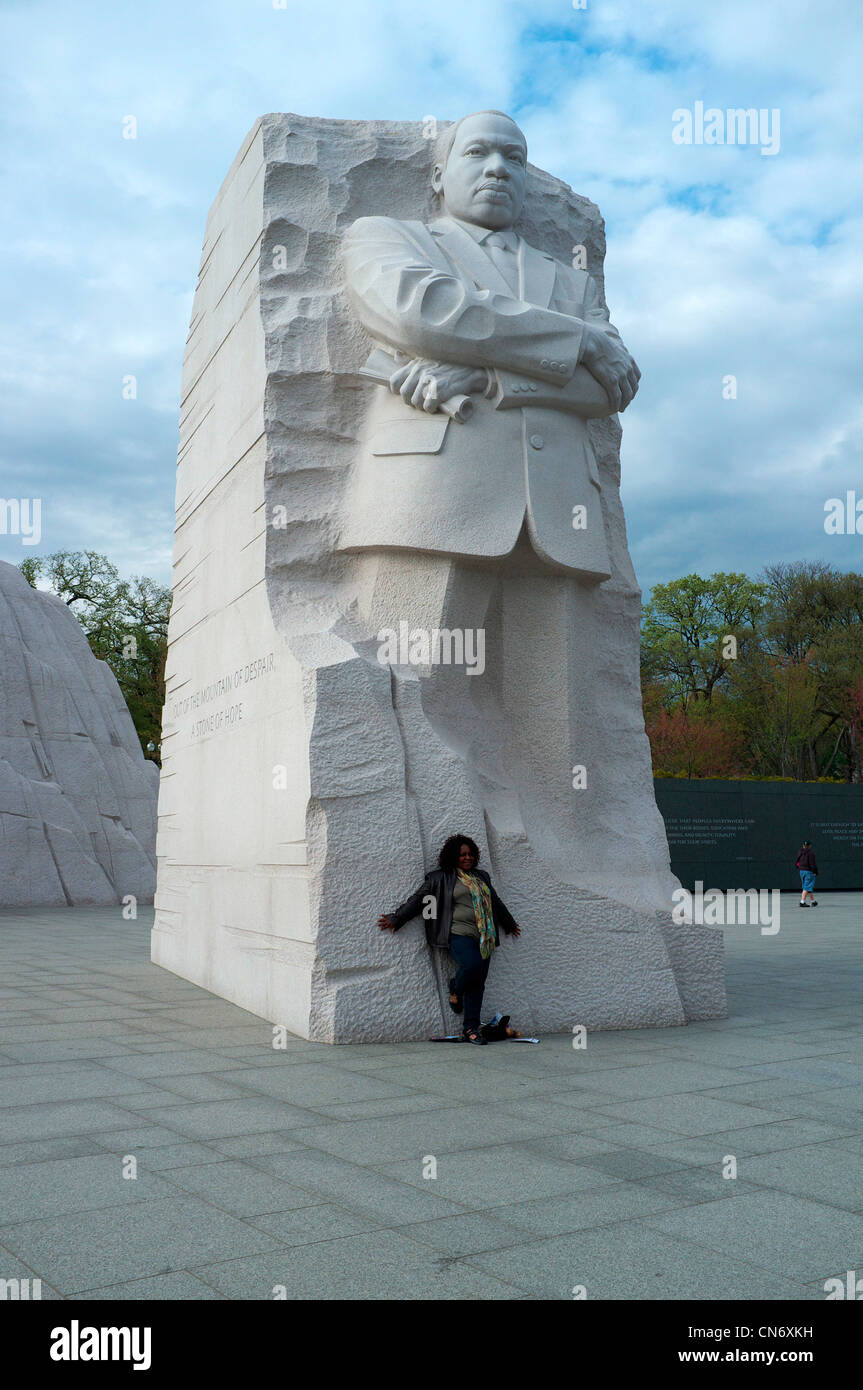 African American Woman standing beneath Sculpture of Martin Luther King ...