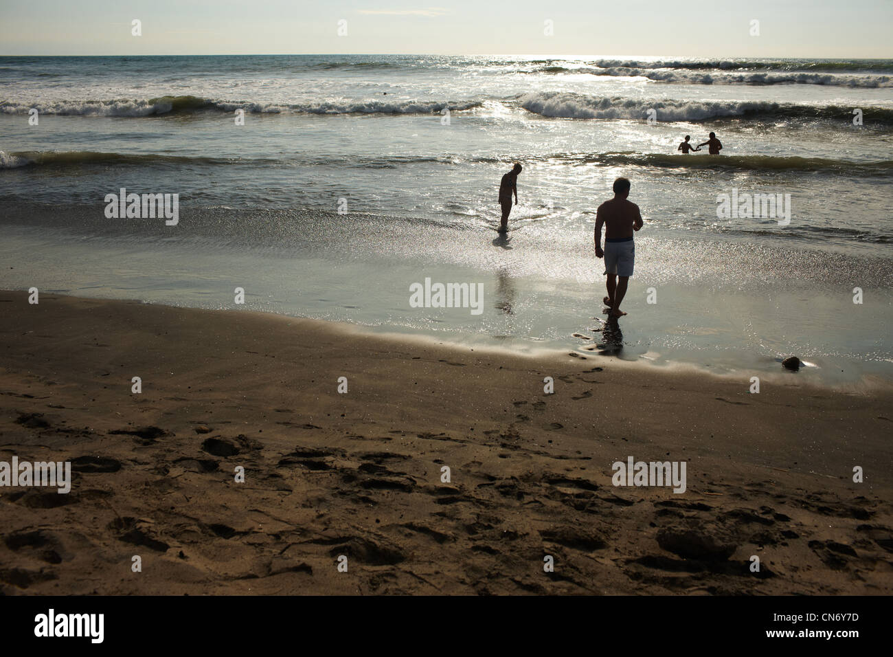 Pacific Beach, a couple of people bathing in the ocean, two people go ...