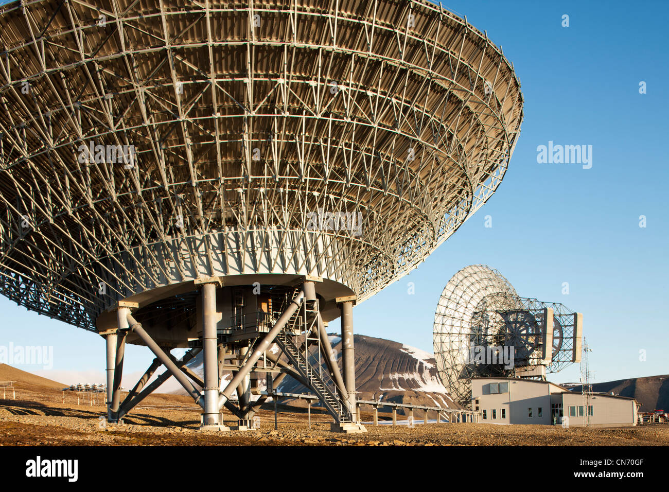Norway, Svalbard, Spitsbergen, Midnight sun lights metal lattice ...