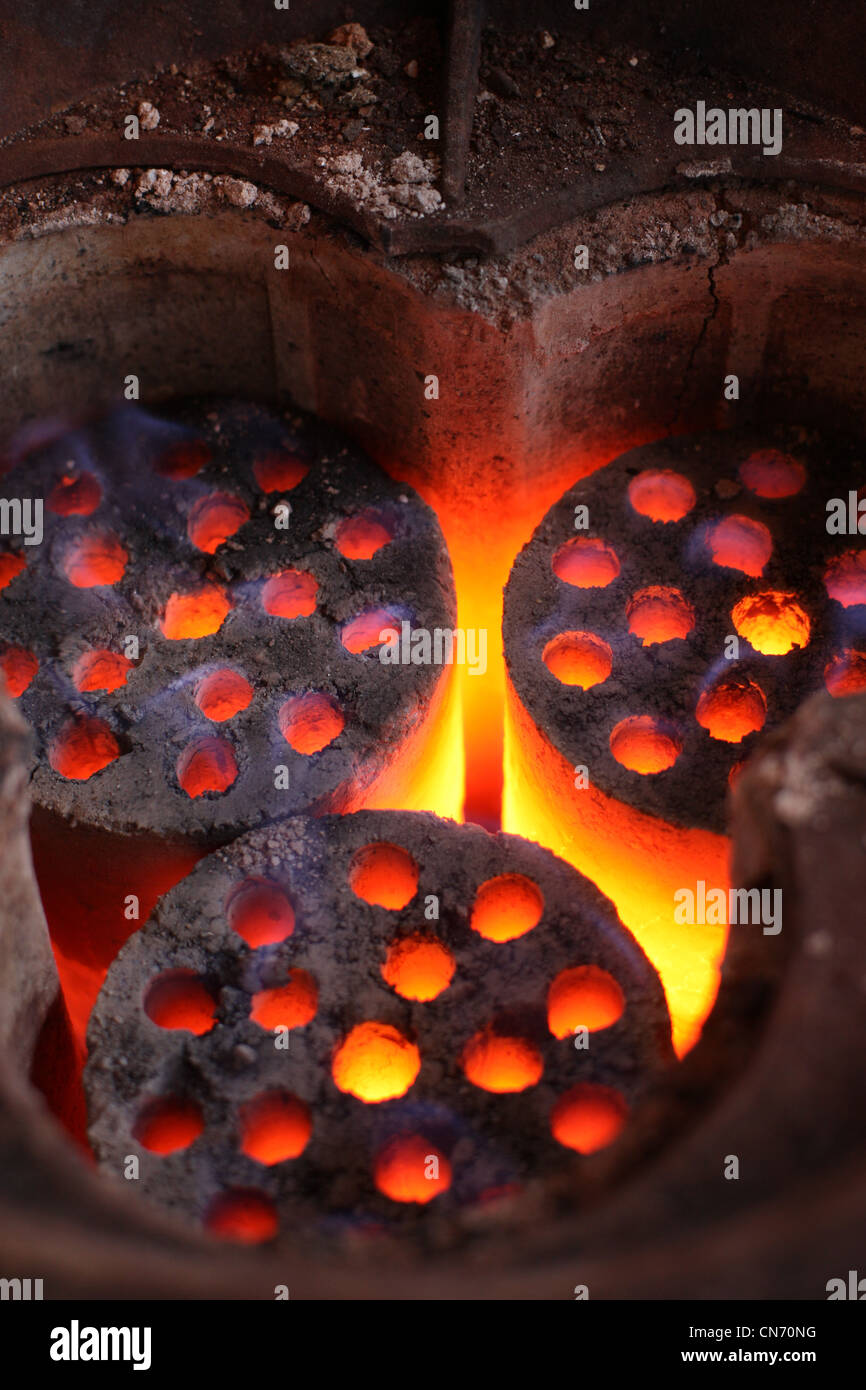A chinese heater using red hot blocks of clay Stock Photo - Alamy